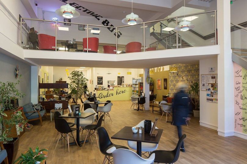 Moments Café | Friends Helping At Home